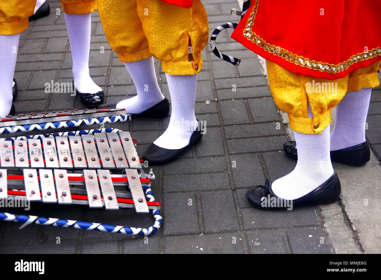 Photo of colorful costumes, attire and props of parade participants ...