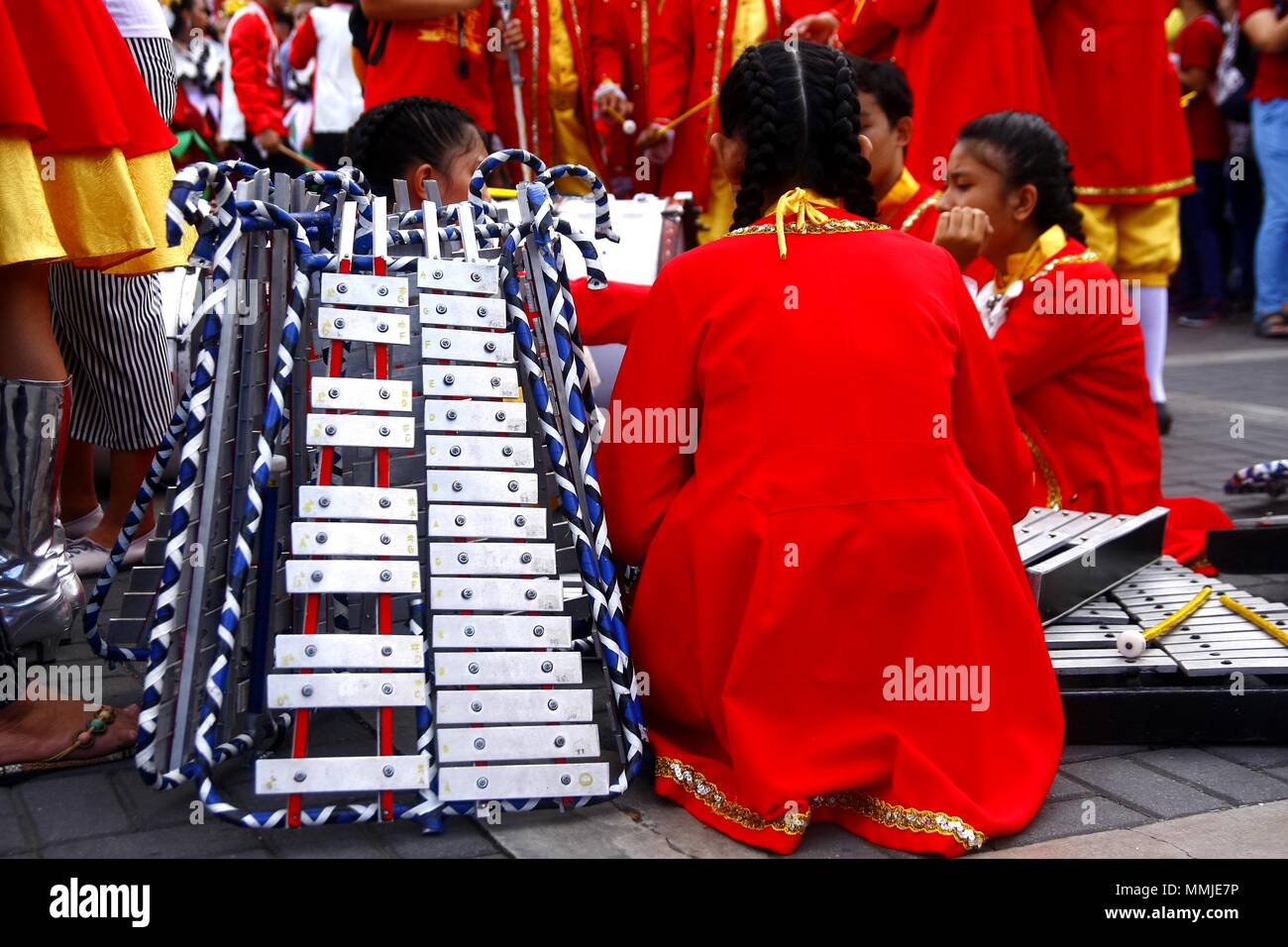 Photo of colorful costumes, attire and props of parade participants ...