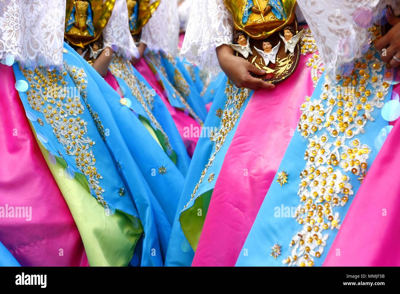 Photo of colorful costumes, attire and props of parade participants ...