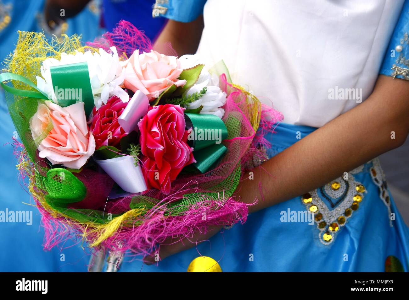Photo of colorful costumes, attire and props of parade participants ...
