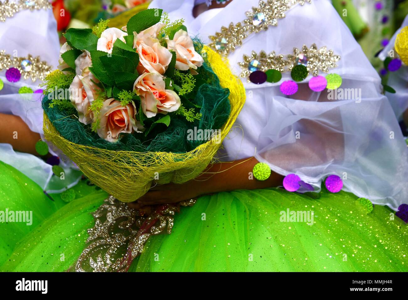 Photo of colorful costumes, attire and props of parade participants ...