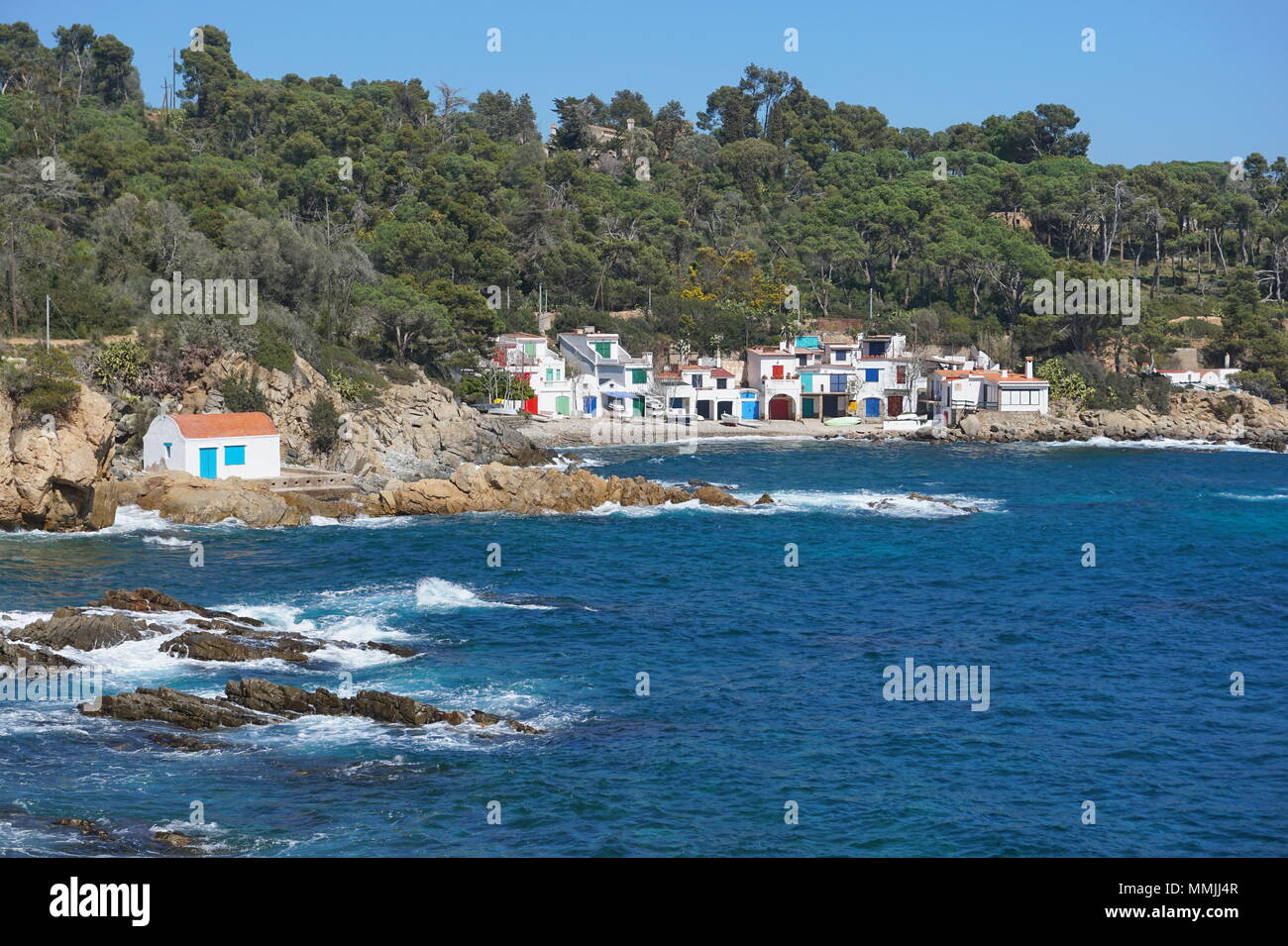 Coastal landscape old fishermen houses in Palamos, Cala S'Alguer, Spain ...