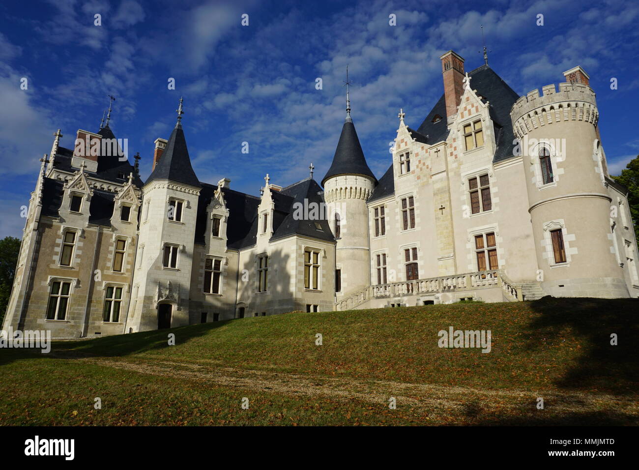 Old limestone castle in the Loire Valley, France on a sunny blue day ...