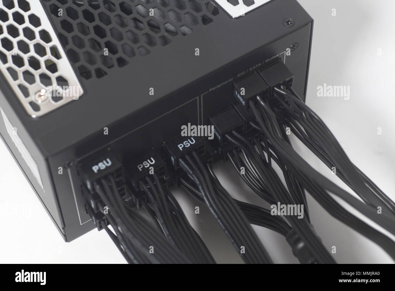 Computer Power Supply Unit with cable on white background Stock Photo ...