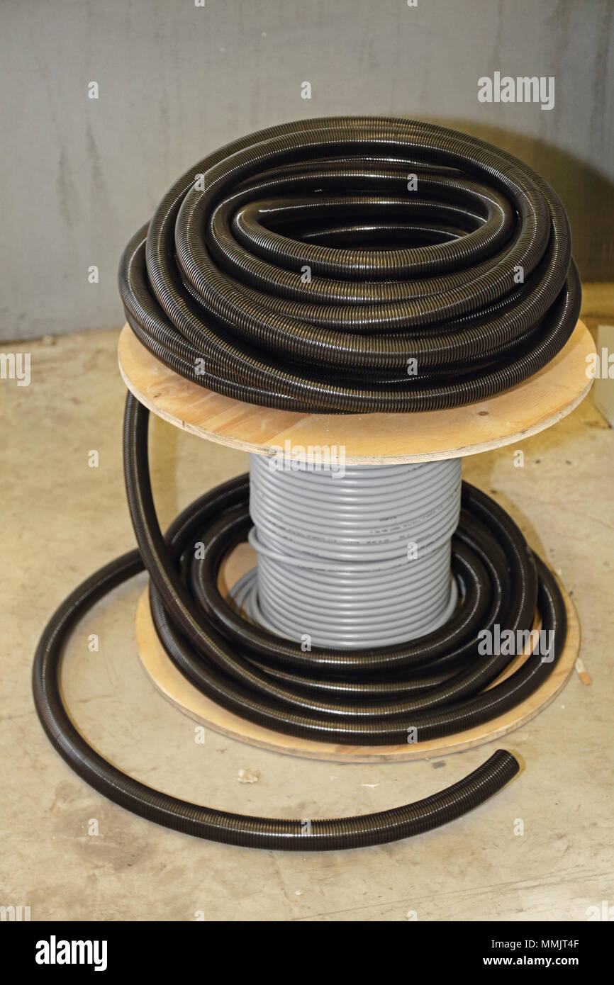 Plastic Hose and Cable Coil for Electrical Installation Stock Photo - Alamy