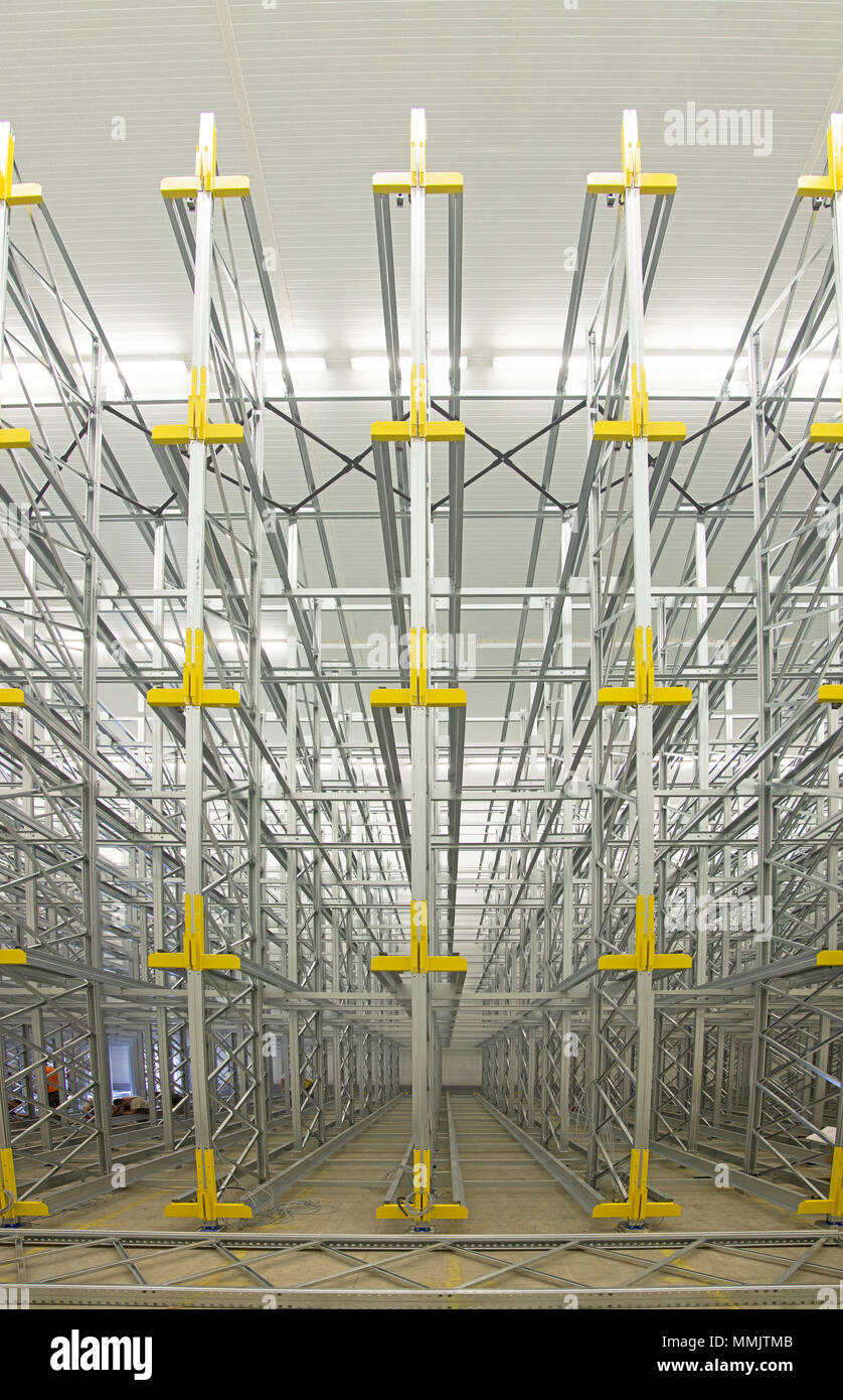 Empty Shelving System Rails in New Automated Warehouse Stock Photo - Alamy