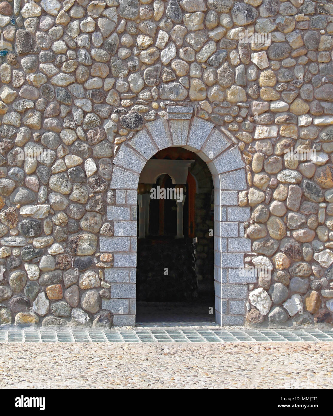 Stone House Exterior With Arch Doorway Stock Photo - Alamy