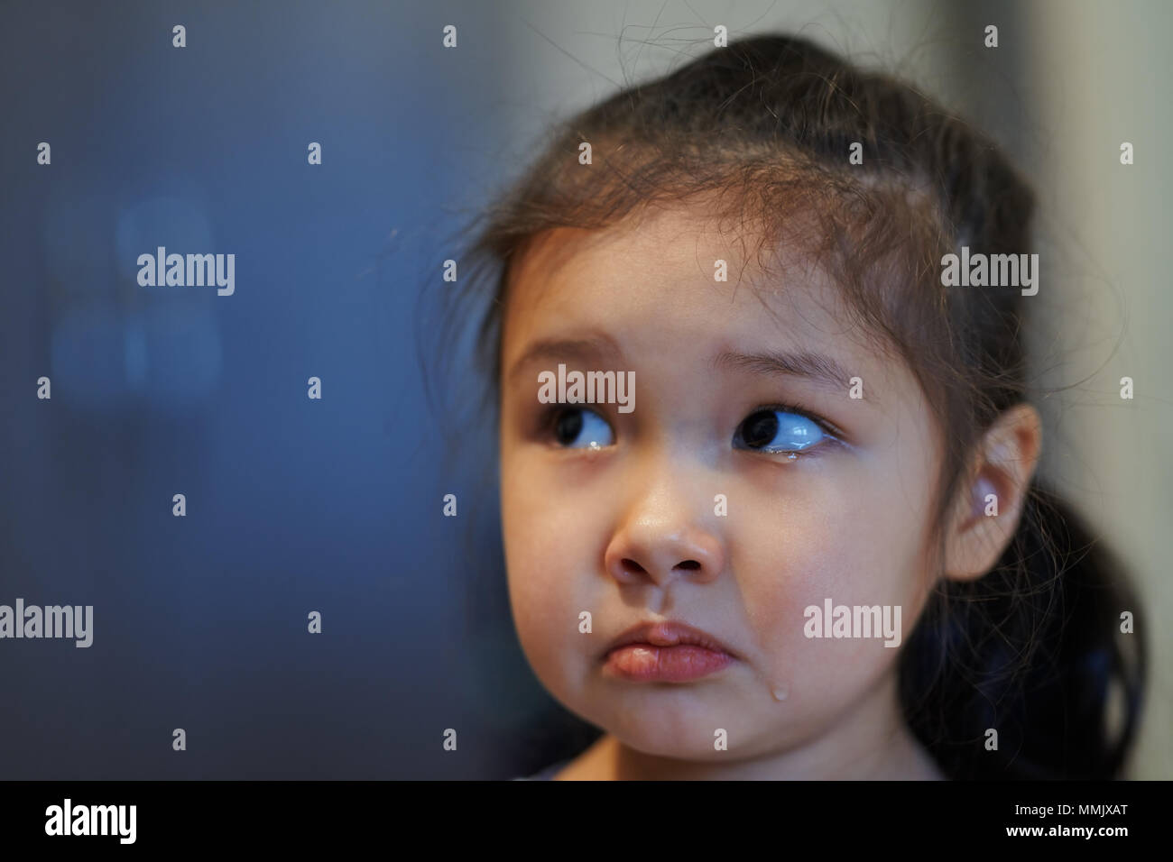 Upset crying girl at home Stock Photo - Alamy