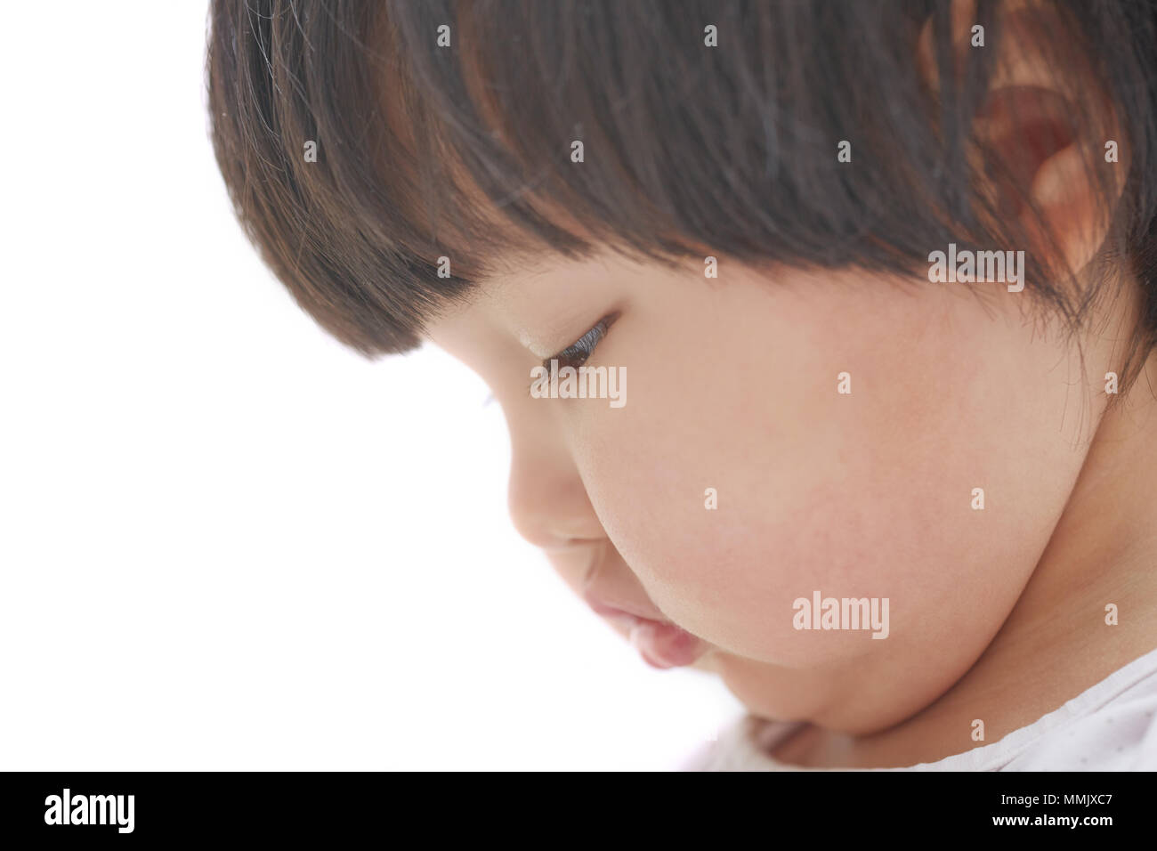 Side view on the child on studio background. Close-up photo Stock Photo ...