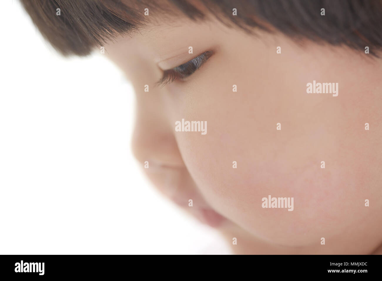 Side view on the child on studio background. Close-up photo Stock Photo ...