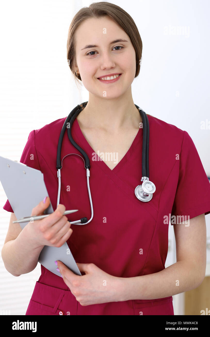 Woman doctor at work in hospital office. Medicine and health care ...
