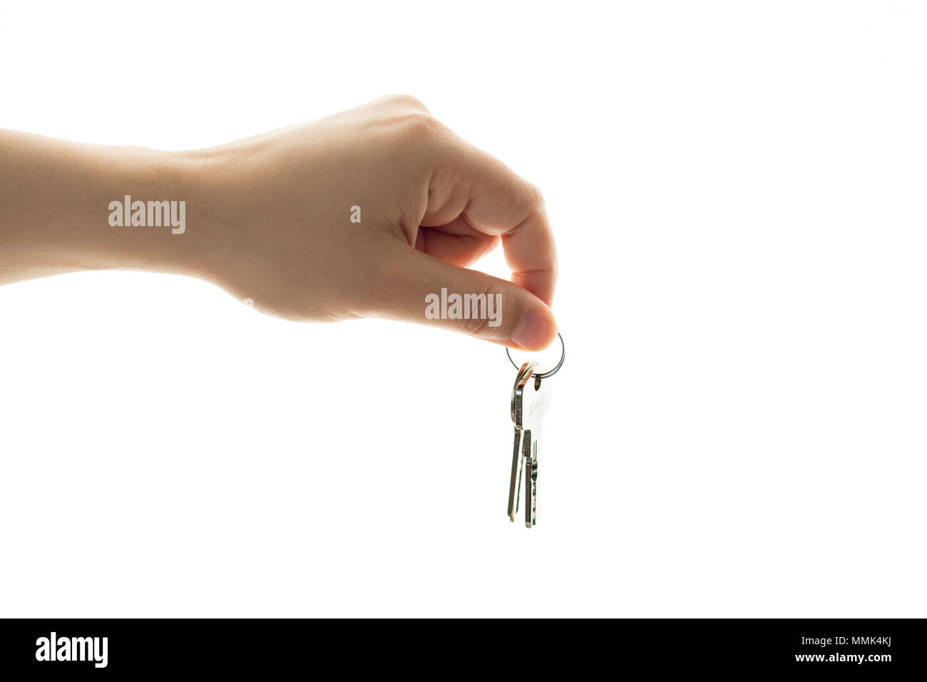 Woman hand with a key Stock Photo - Alamy
