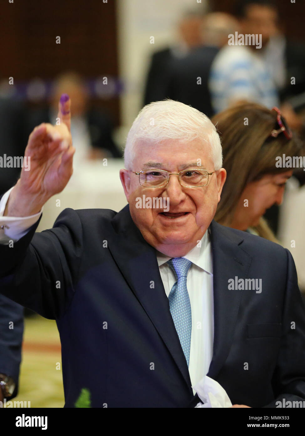 Baghdad, Iraq. 12th May, 2018. Iraqi President Fuad Masoum shows his ...
