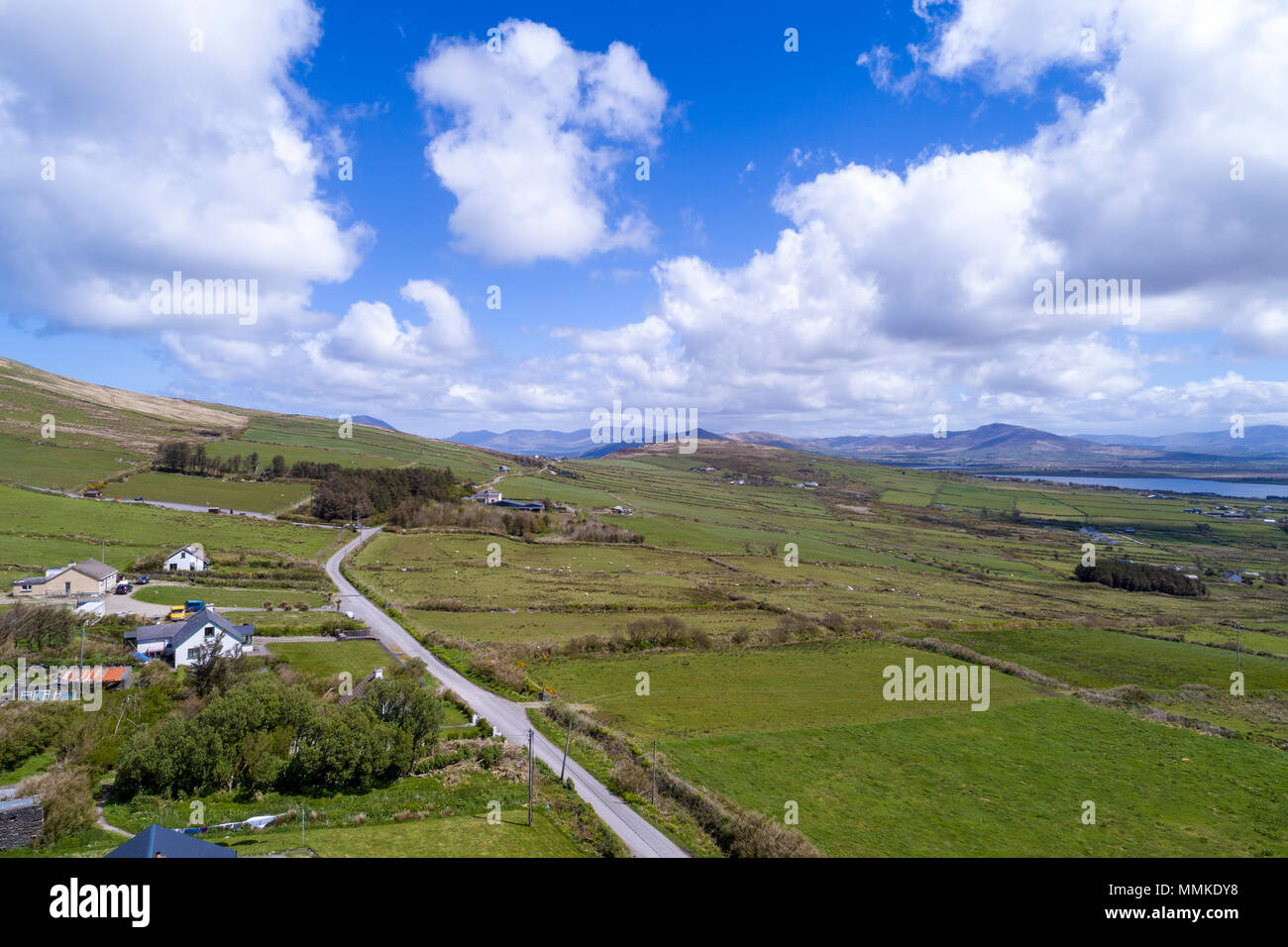 Valentia Island, County Kerry Ireland with bright blue sky and fluffy ...