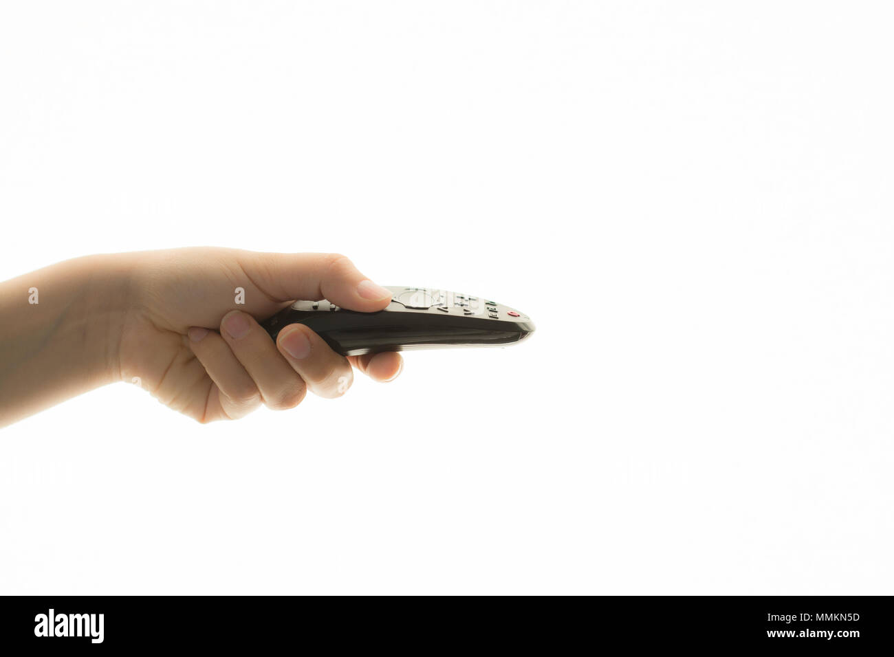 Using TV Remote Control Stock Photo - Alamy