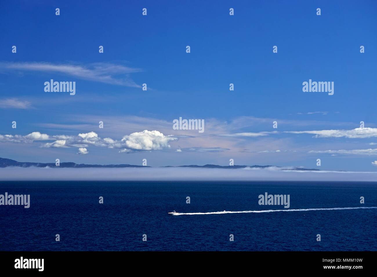 Morning at sea: Clouds and fog over Alaskan islands in the North ...