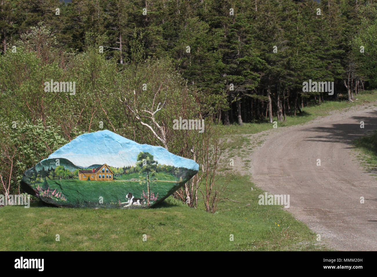 Oil painting on rock at property entrance in the Codroy Valley ...