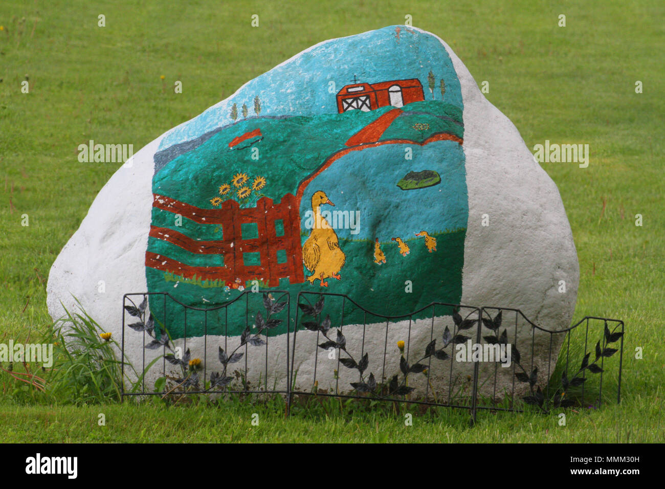 Oil painting on rock at property entrance in the Codroy Valley ...