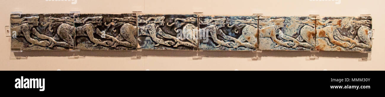 Naiads clinging together, frieze, blue glazed. before 1900. Bigot ...