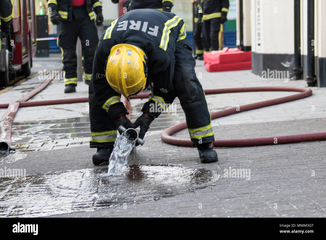London fire brigade uniform hi-res stock photography and images - Alamy
