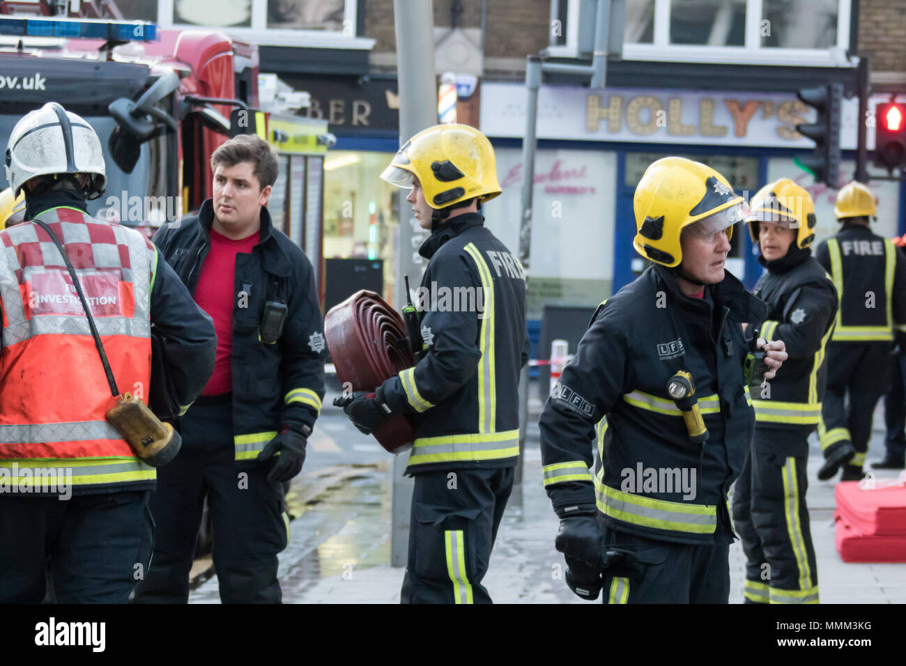 Team london brigade firefighters hi-res stock photography and images ...