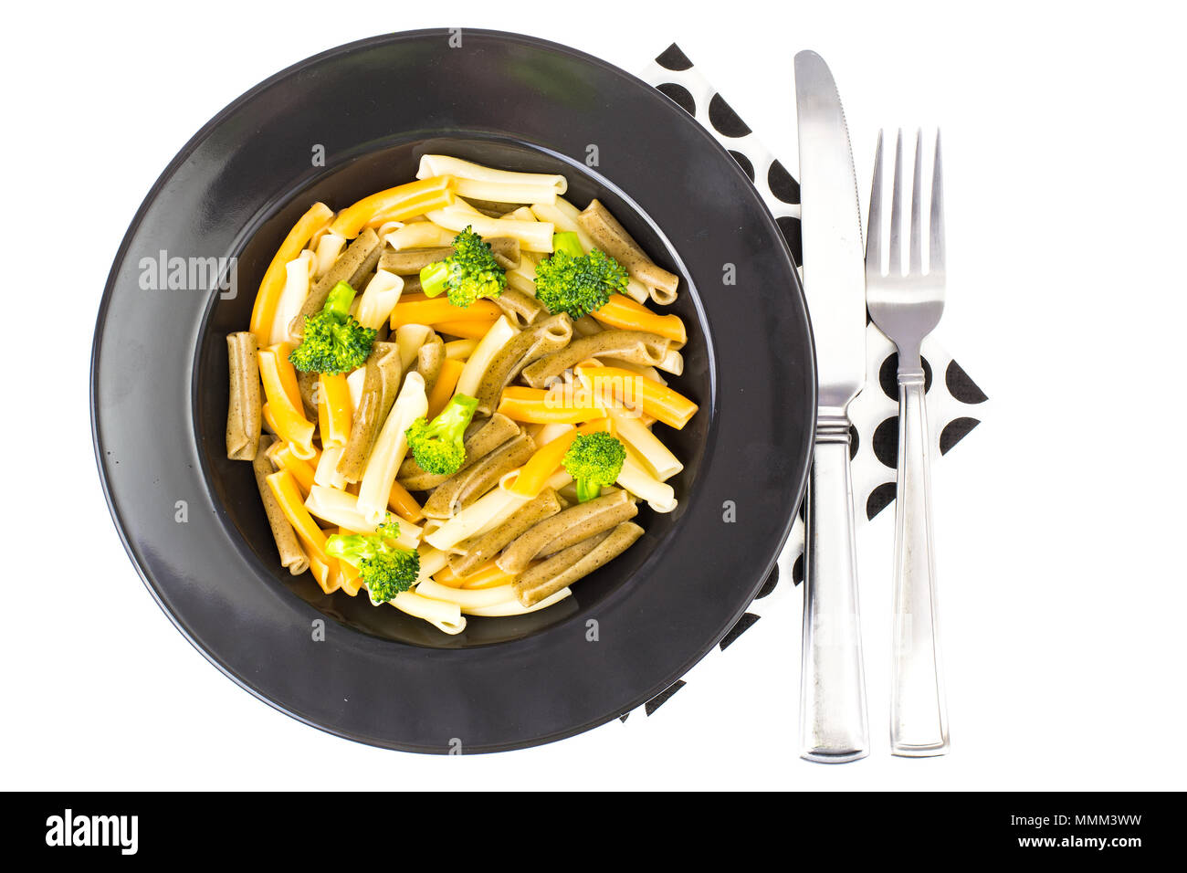 Black plate with macaroni isolated on white. Studio Photo Stock Photo ...
