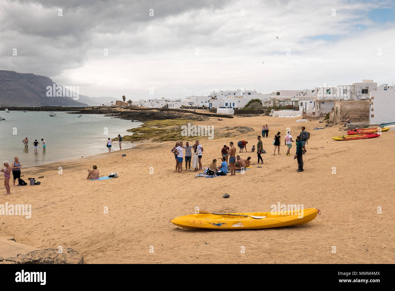 CALETA DEL SEBO, LA GRACIOSA, SPAIN - MAY 5, 2018: People enjoying a ...