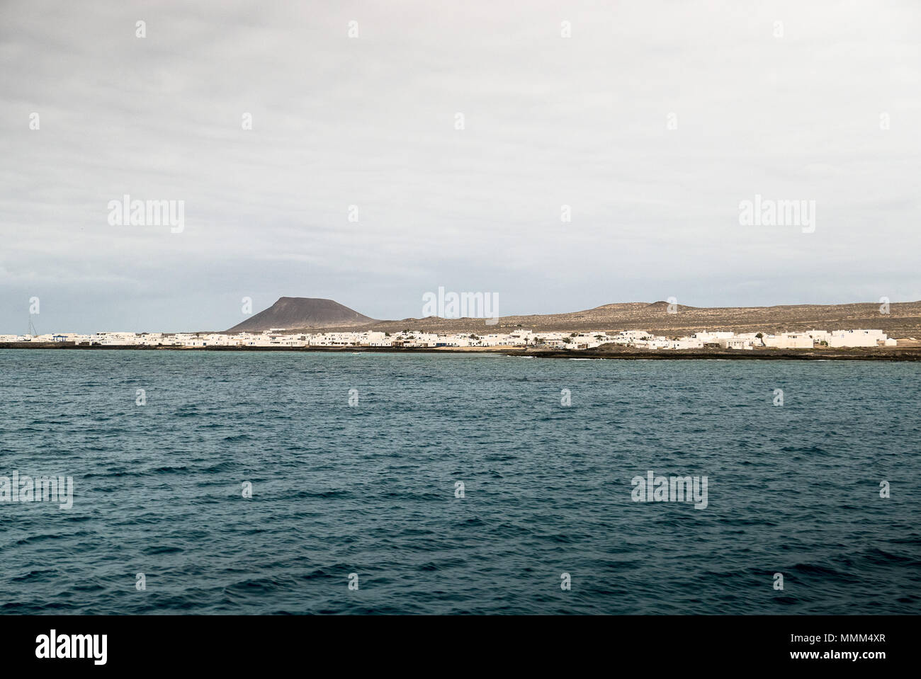 View of the town of Caleta del Sebo, on the island La Graciosa, from ...