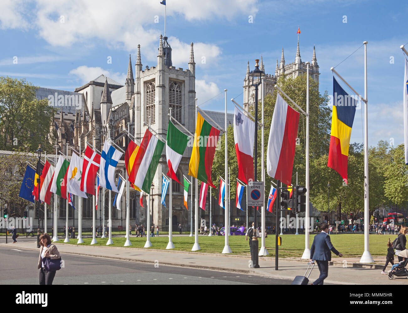 London, Westminster. A colourful array of national flags in Parliament ...