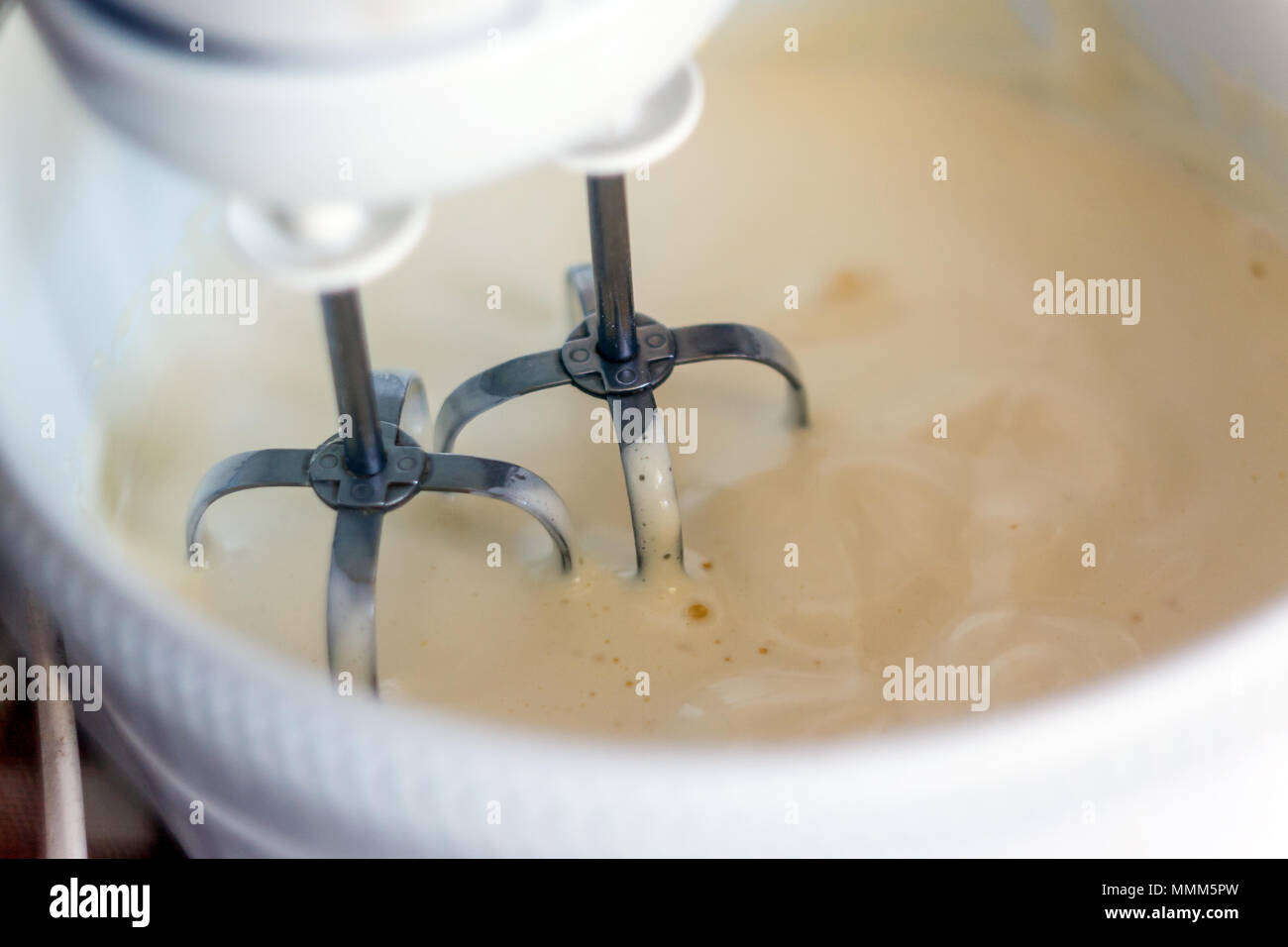 Making of a cream for home-made cakes on a mixer Stock Photo - Alamy