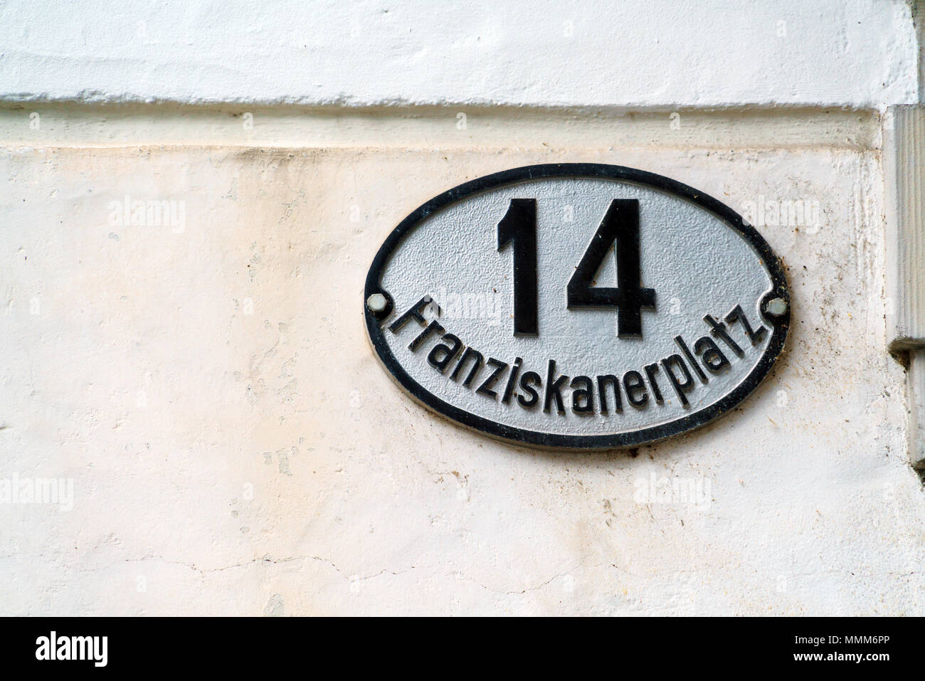 Typical street signs on the walls of the houses of the old city ...