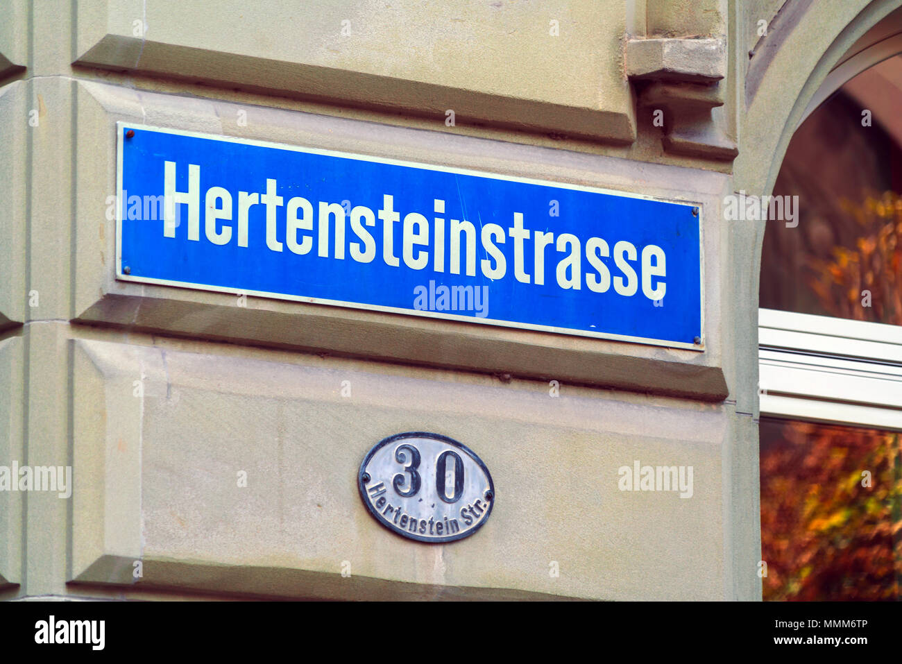 Typical street signs on the walls of the houses of the old city ...