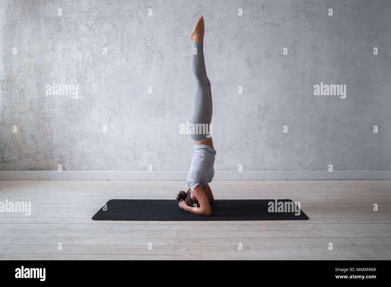Woman practicing advanced yoga. A series of yoga poses Stock Photo - Alamy