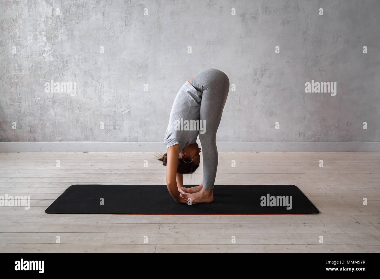 Woman practicing advanced yoga. A series of yoga poses Stock Photo - Alamy