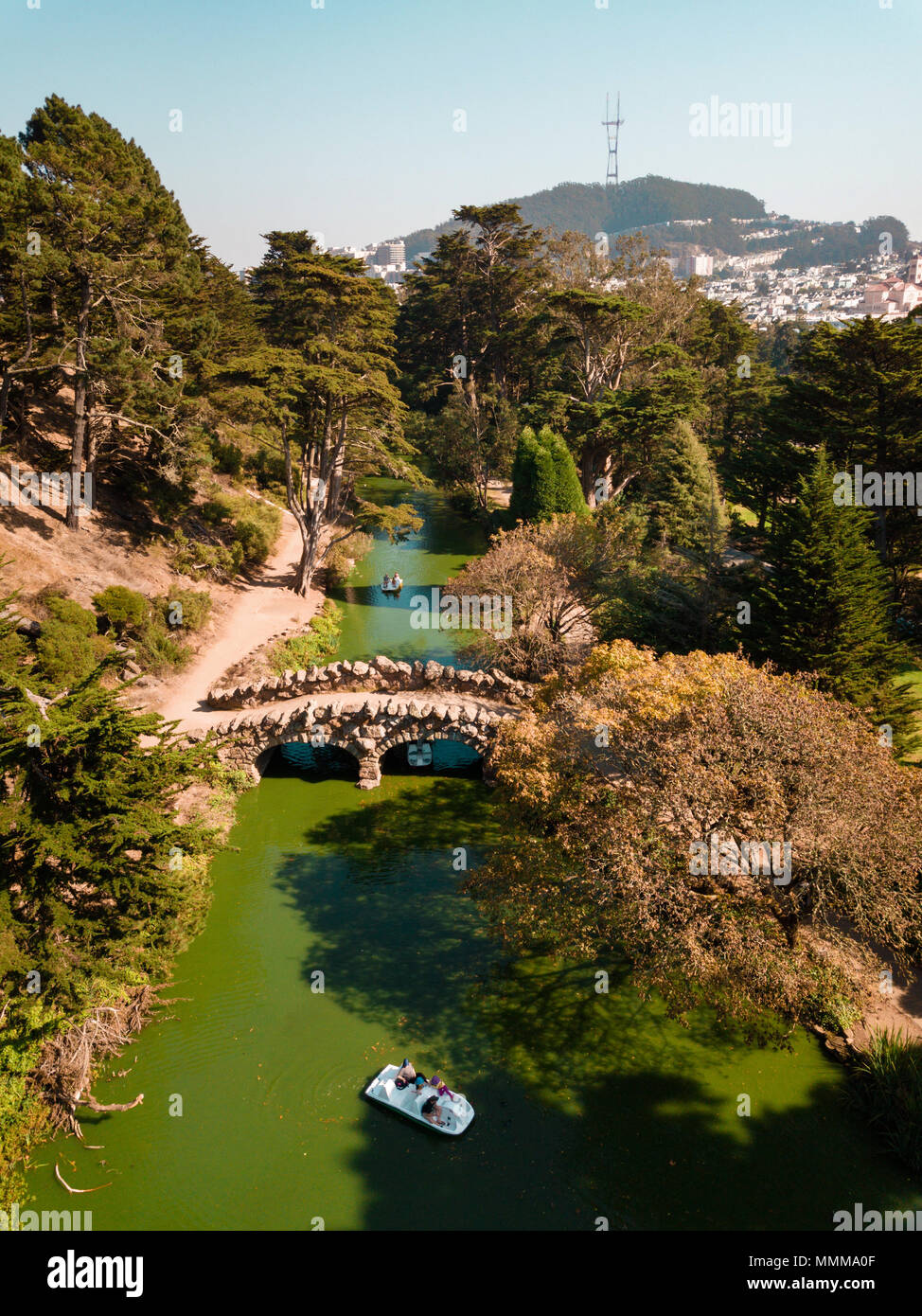 Stone bridge and a green river in Golden Gate park in San Francisco ...