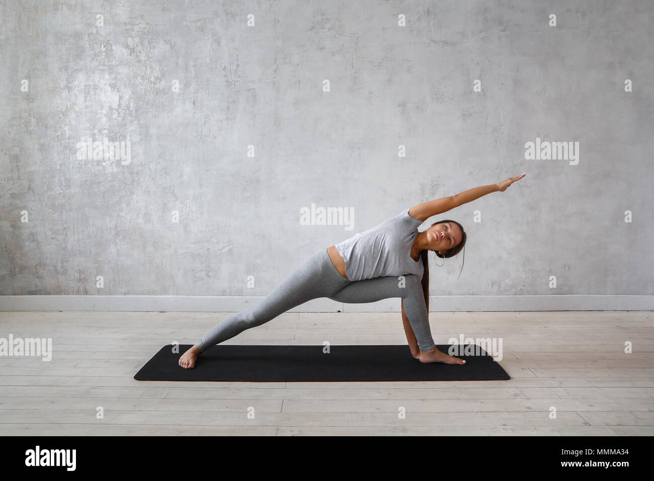 Woman practicing advanced yoga. A series of yoga poses Stock Photo - Alamy