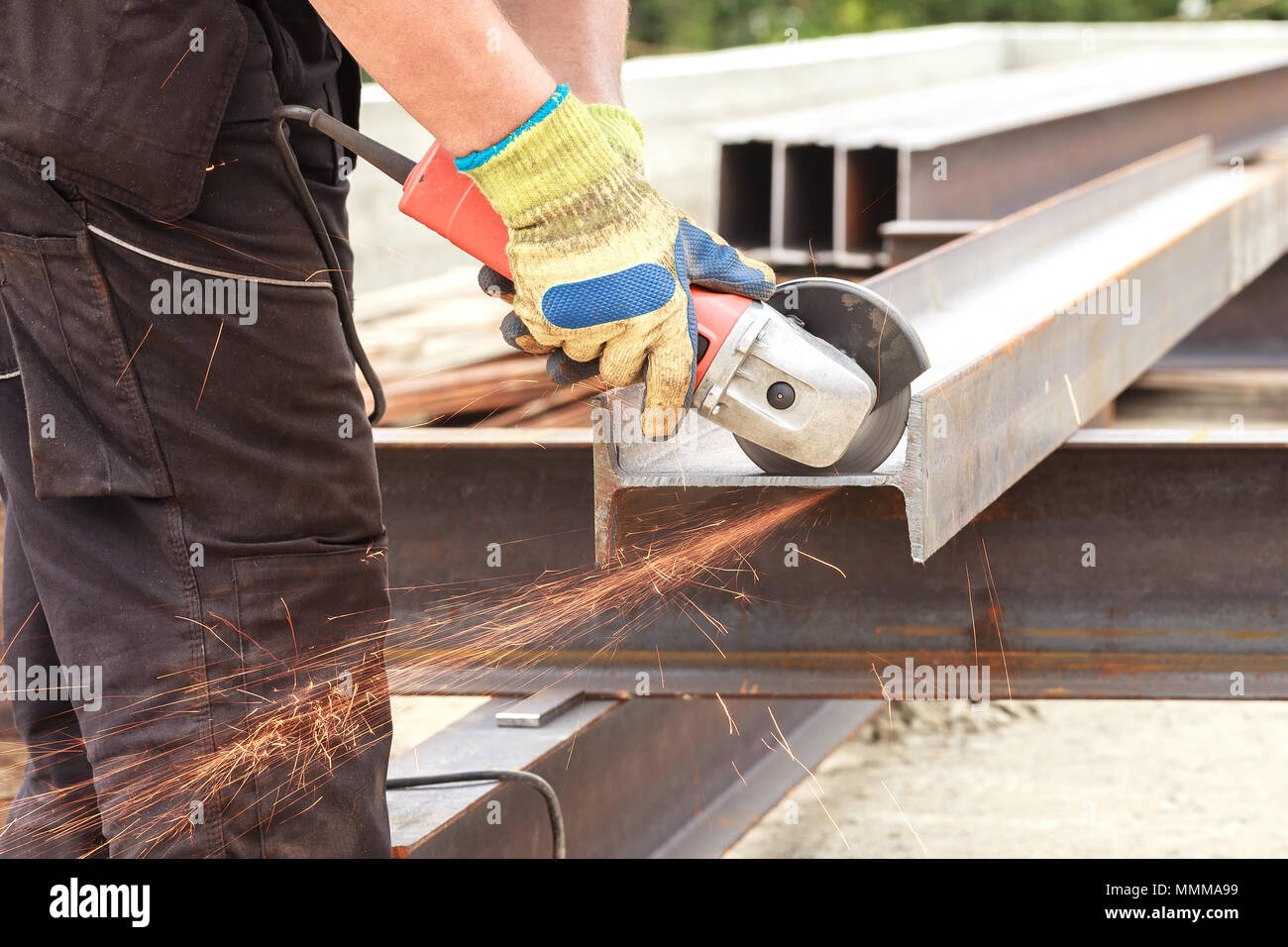 Cutting steel heavy industry by electric flex Stock Photo - Alamy