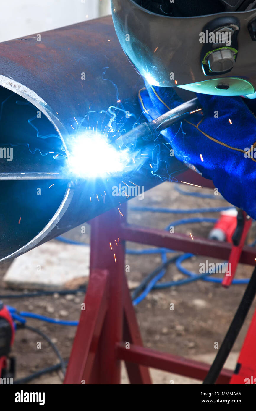 Welding work, welder welding metal material in heavy industry ...