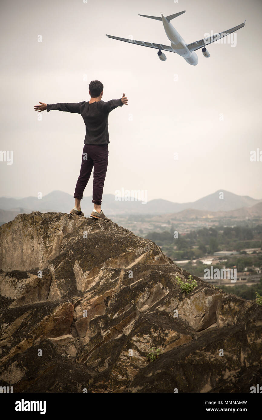 man standing on the edge of the mountain Stock Photo - Alamy