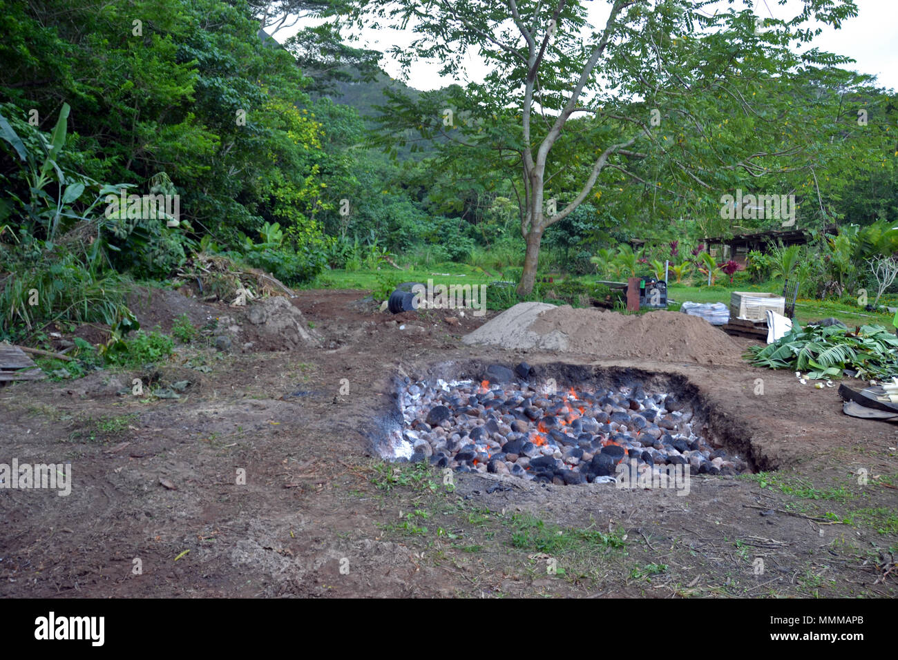 Traditional underground Hawaiian fire oven or imu, Waimanalo, Oahu ...