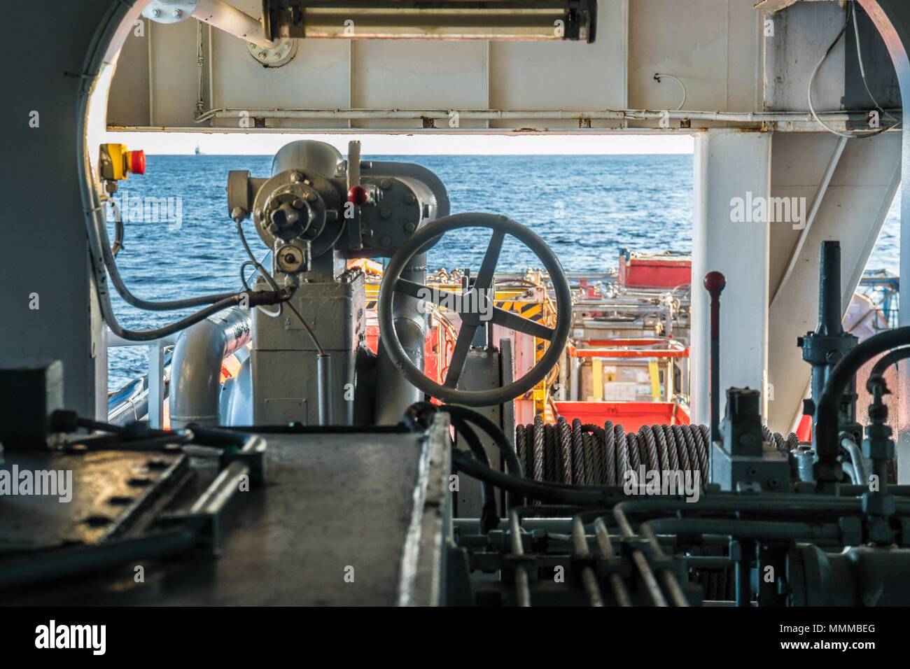 offshore supply boat with containers and tanks onboard delivers cargo ...