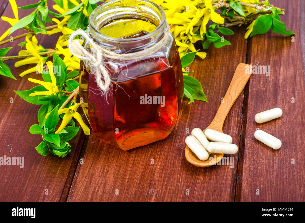 Natural flowers capsules, pills. Studio Photo Stock Photo - Alamy