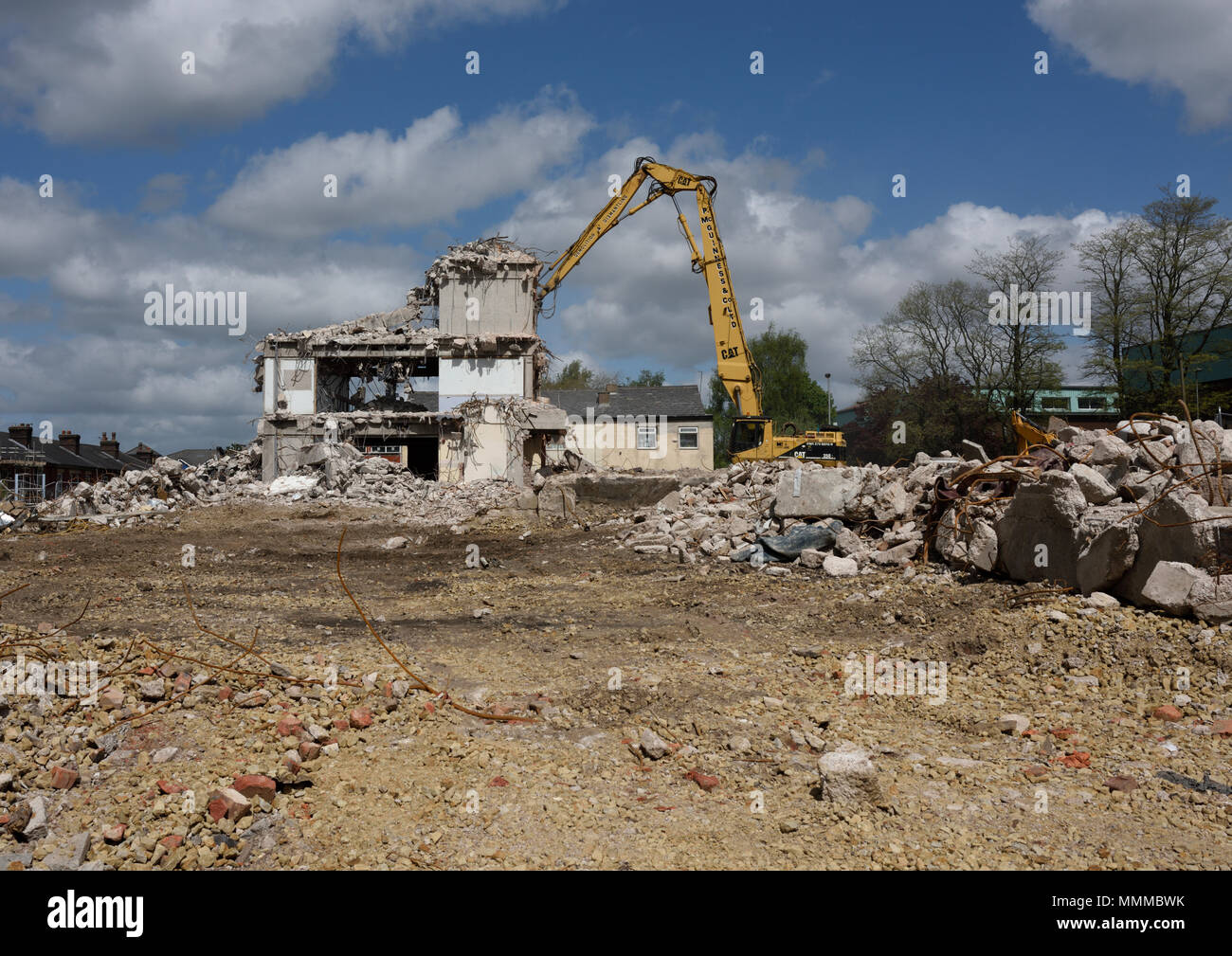 Controlled demolition of multi storey reinforced concrete building ...