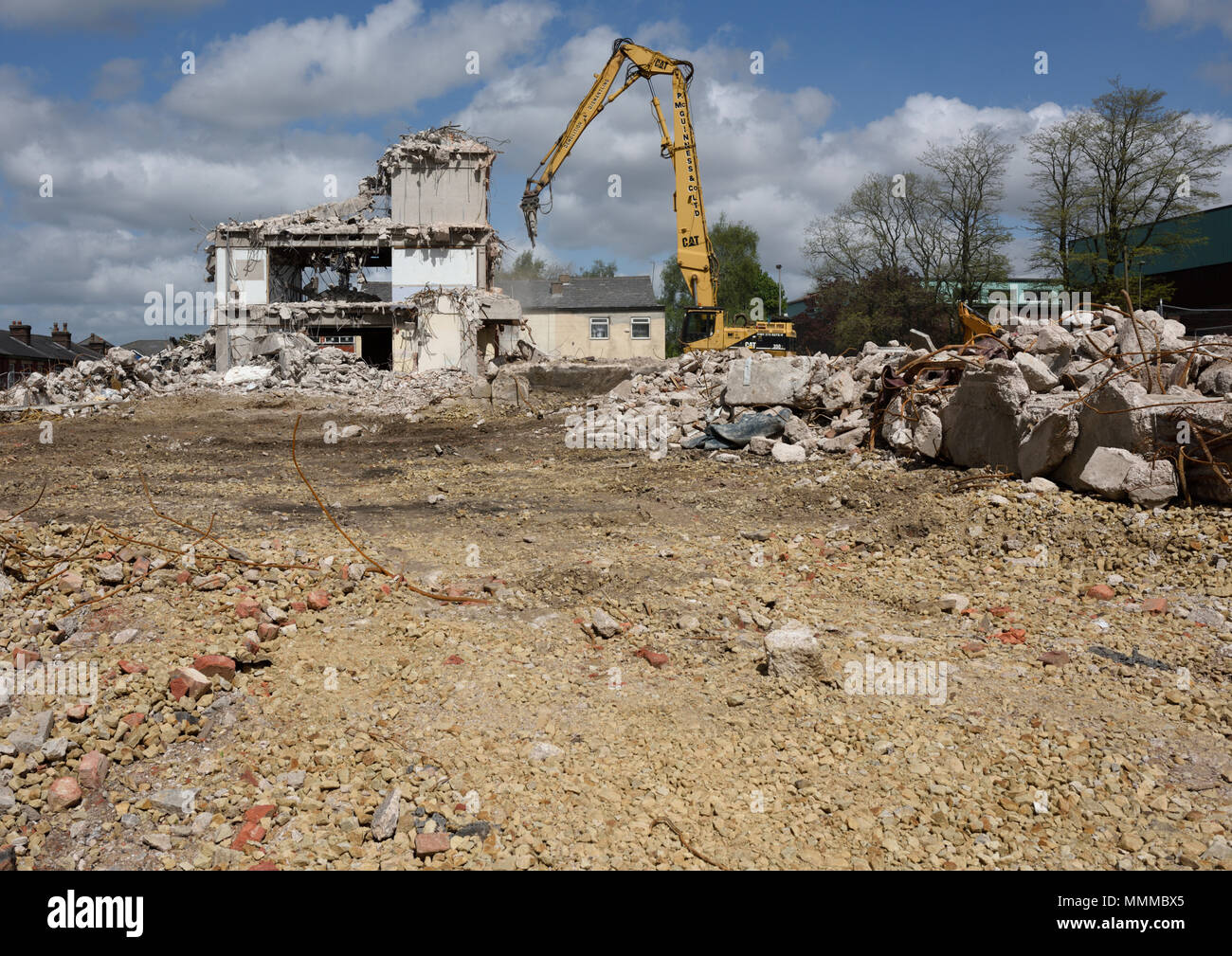 Controlled demolition of multi storey reinforced concrete building ...