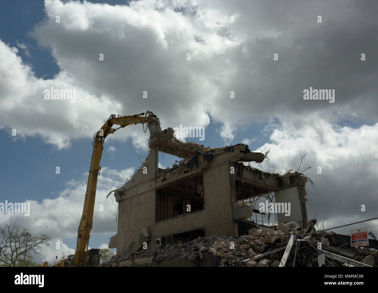 Controlled demolition of multi storey reinforced concrete building ...