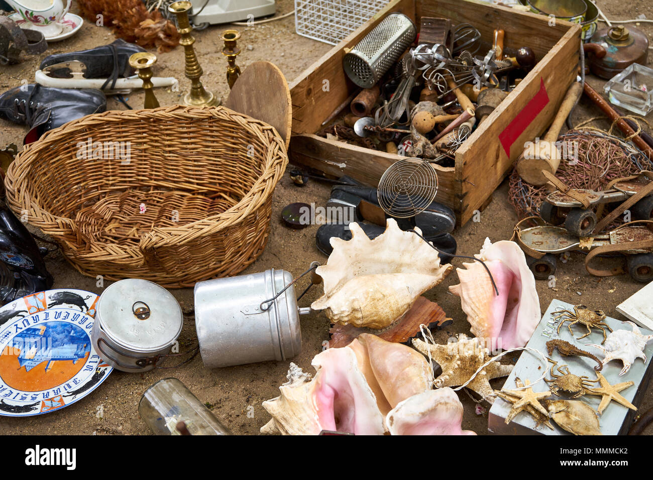 Antiques Stand At A Flea Market Including Furniture Plates Sea Shells ...
