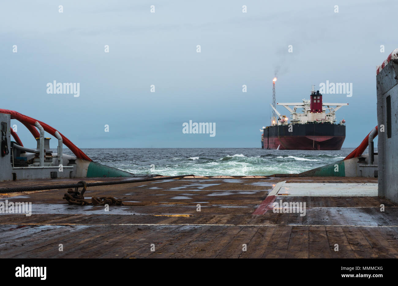 Anchor-handling Tug Supply AHTS vessel during dynamic positioning ...