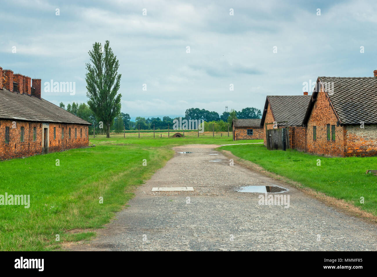 Auschwitz, Poland - August 12, 2017: brick hut in Auschwitz Birkenau ...