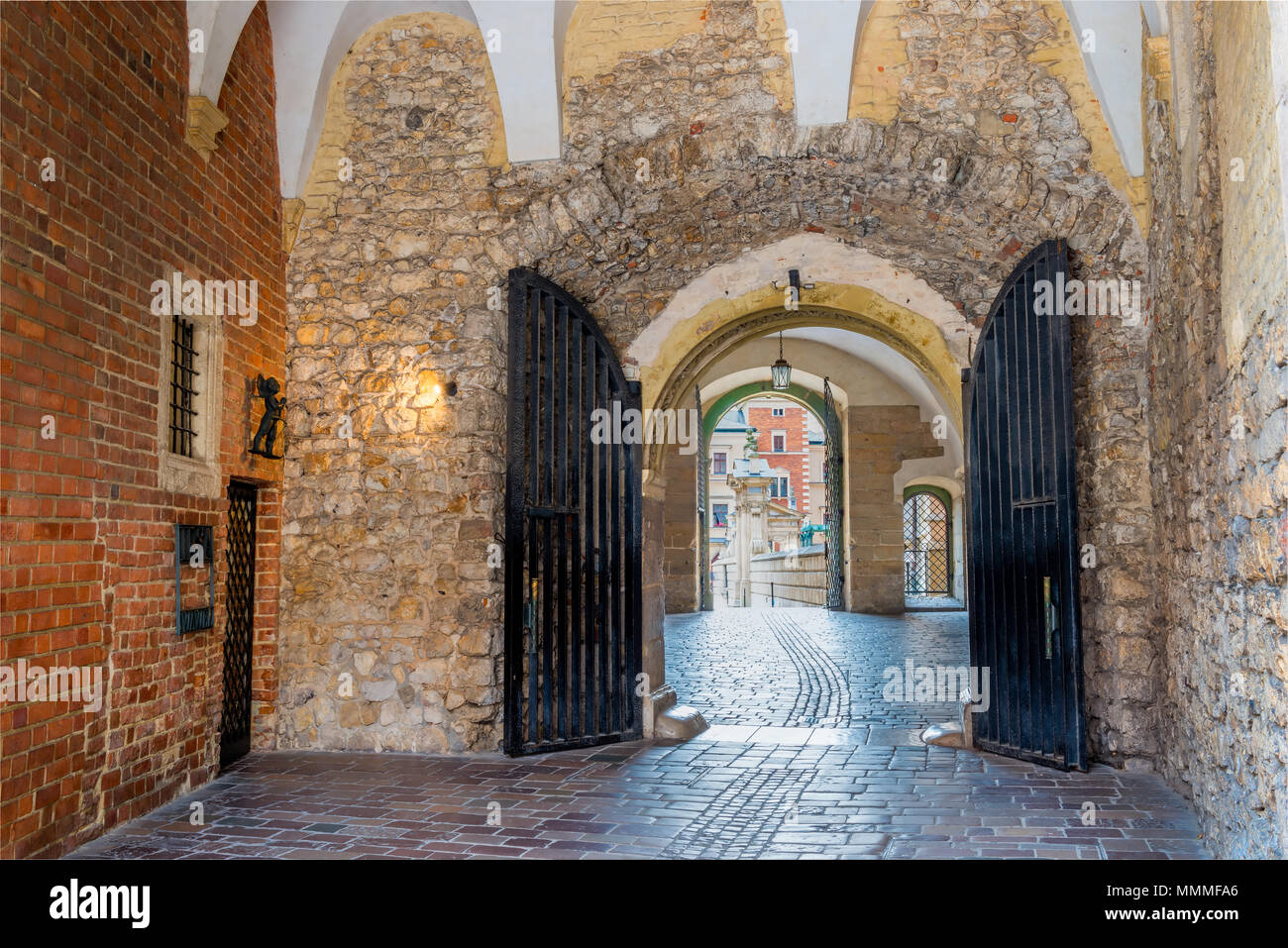 beautiful arch of stone castle and stone pavement of the Middle Ages ...