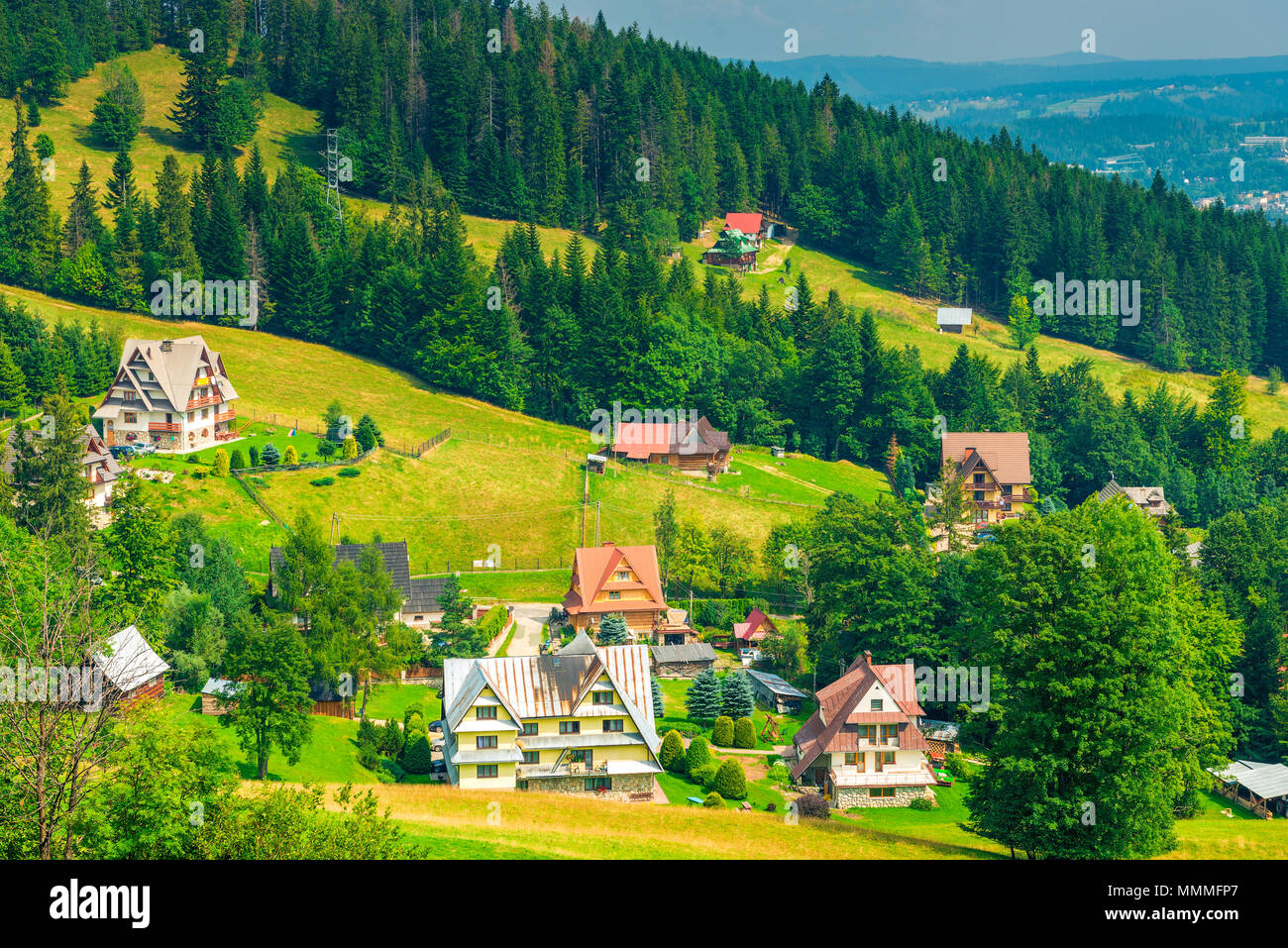 rural beautiful European houses on the slope of the mountain, view from ...